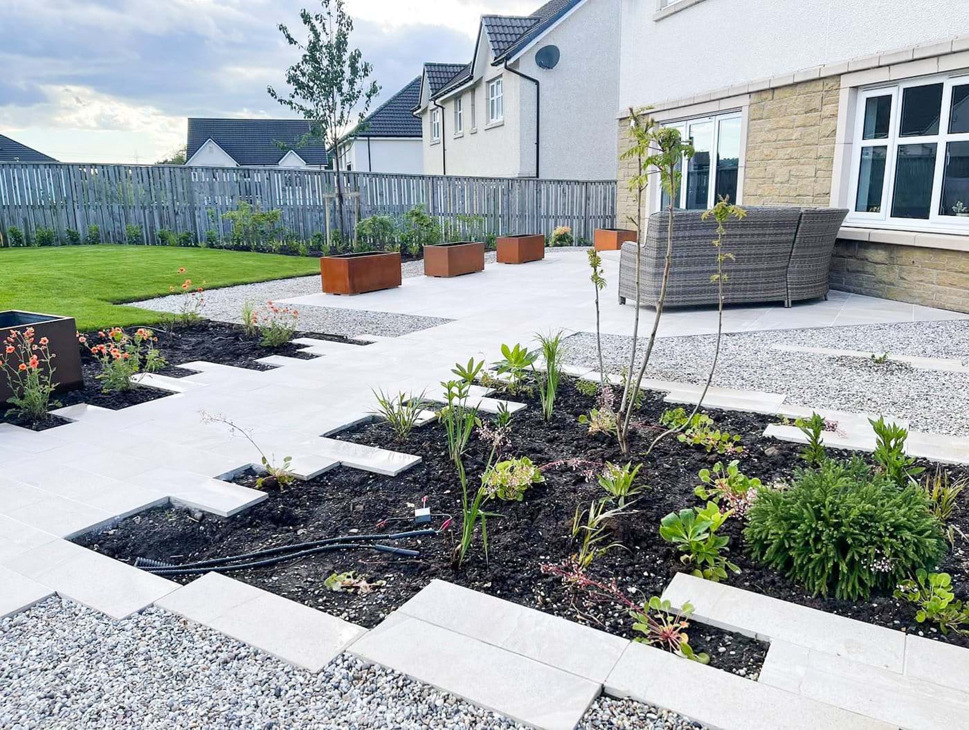Rustic Water Feature and Planters | Livingreen Design